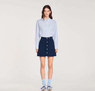 Sandro Jupe courte c&ocirc;tel&eacute;e &agrave; pressions