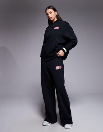 Nike Pantalon de jogging ample et oversize &agrave; taille haute - Noir