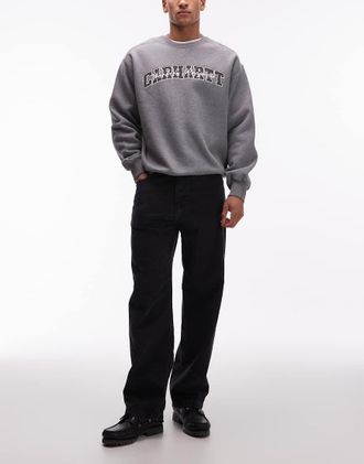 Carhartt Work in Progress Landon - Schmal zulaufende, locker geschnittene Jeans in gebleichtem Schwarz