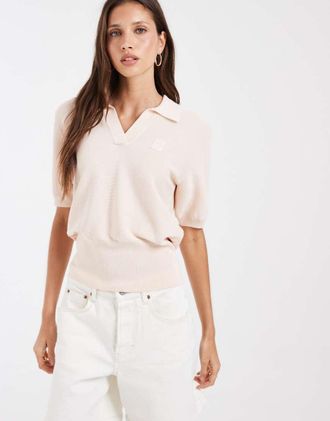 Lacoste Polo en maille &agrave; manches courtes et logo - Rose