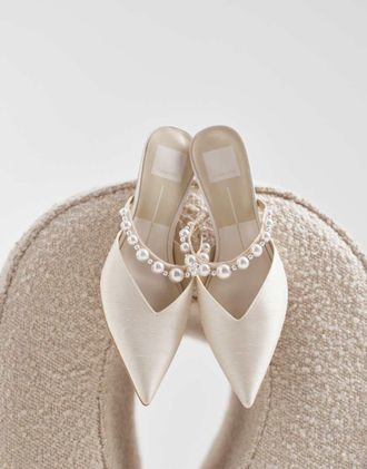 Dolce Vita Kanika - Spitze Braut-Mules in Elfenbeinwei&szlig; aus Satin mit Perlenriemen