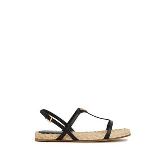 Prada Sandales plates en cuir et raphia