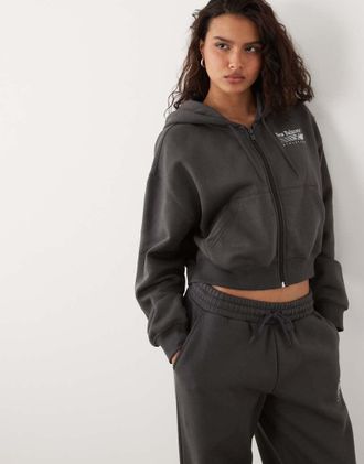 New Balance sweat &agrave; capuche zipp&eacute; int&eacute;gral en polaire gris-Noir