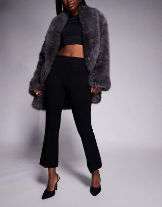 Good American Weiche Schlaghose in Schwarz aus Stretch-Ponte