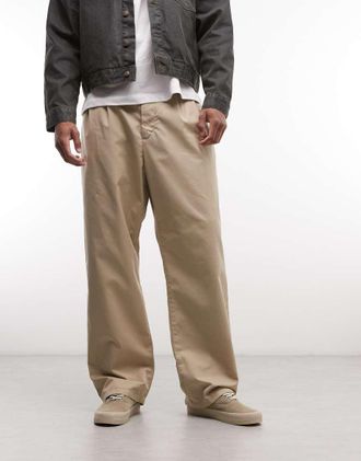 Carhartt Work in Progress Evan - Schmal zulaufende Hose in Beige mit lockerem Schnitt-Neutral