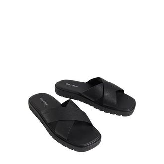 Calvin Klein Sandales plates mules en cuir