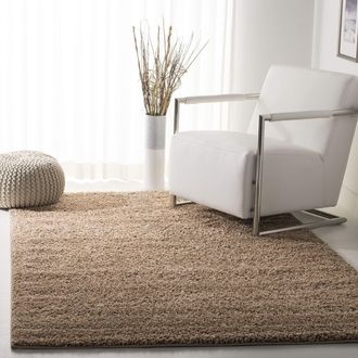 Safavieh Zottelig Teppich f&uuml;r Wohnzimmer, Esszimmer, Schlafzimmer - New York Shag Collection, Hoher Flor, Dunkles Beig, 91 X 152 cm