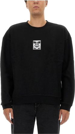 Obey Homme, Sweatshirts et sweats &agrave; capuche, Noir, Taille: M Iconic Graphic Crewneck SweaT-shirt