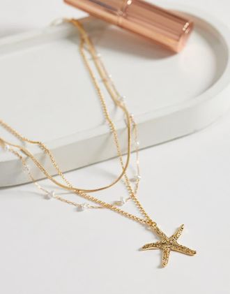 Orelia Collier multi-rangs en plaqu&eacute; or 18 carats &agrave; pendentif &eacute;toile de mer et perles-Dor&eacute;