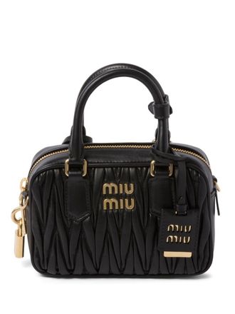 Miu Miu mini sac en cuir matelass&eacute; &agrave; plaque logo - Noir
