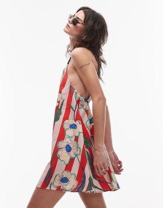 Topshop Robe rayée coupe courte et fluide avec bretelles ornées de perles et imprimé fleuri - Rouge-Multicolore