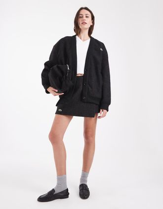 Lacoste Tennisrock aus Wollwalk als Kombiteil in Dunkelgrau