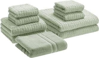 Beliani Badehandtuch Set mit Badematte 9-teilig Hellgr&uuml;n Baumwolle Frottee Handt&uuml;cher in verschiedenen Gr&ouml;&szlig;en Badteppich Bad Ausstattung Accessories