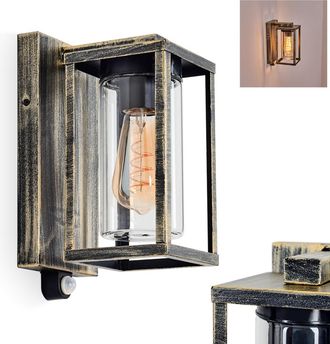 HOFSTEIN Außenwandleuchte Portalis, Außenleuchte mit Bewegungsmelder aus Metall/Glas in Schwarz-Gold/Klar, moderne Wandlampe für Eingangsbereich, 1 x E27, ohne