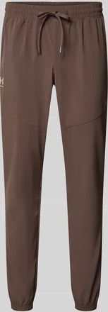 Under Armour Relaxed Fit Trainingshose mit Label-Print