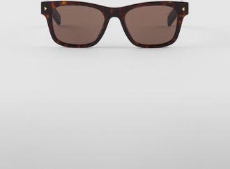 Prada Sonnenbrille mit ikonischer Plakette aus Metall