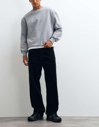 Carhartt Work in Progress pantalon en velours c&ocirc;tel&eacute; coupe loose tapered vert fonc&eacute;