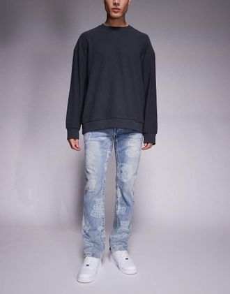 True Religion Ricky - Gemusterte Straight-Jeans in hellblauer Waschung
