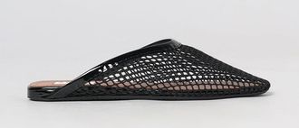 Alaia Flache Mules aus Lackleder und PVC mit perforiertem Design