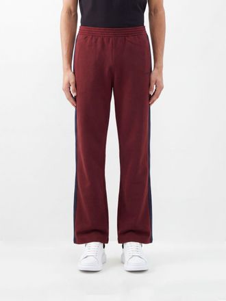 Alexander McQueen McQueen Pantalon de jogging en m&eacute;lange de coton &agrave; bandes lat&eacute;rales