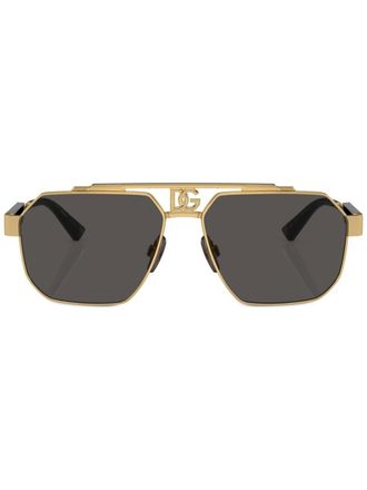Dolce & Gabbana Eyewear lunettes de soleil &agrave; plaque logo - Or