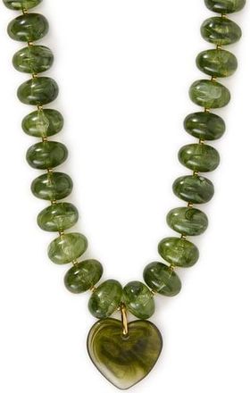 Au Printemps Paris Collier pendentif caur