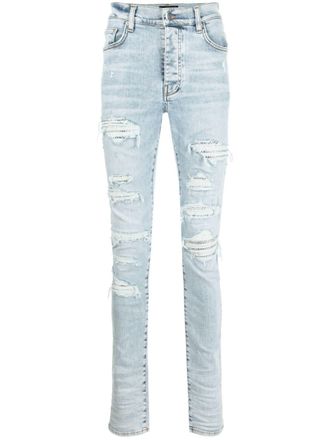 Amiri jean skinny &agrave; effet us&eacute; - Bleu