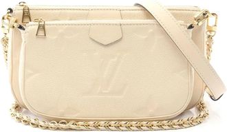 Louis Vuitton 2021-2025 Monogram Giant Empreinte Multi Pochette Accessoires satchel - Braun