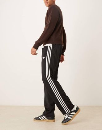 adidas Originals Firebird - Pantalon de surv&ecirc;tement - Noir