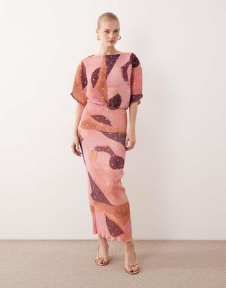 Never Fully Dressed Tilly - Robe pliss&eacute;e longueur mollet &agrave; &eacute;paules d&eacute;nud&eacute;es avec imprim&eacute; &agrave; pois m&eacute;tallis&eacute;s - Rose