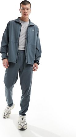 New Balance AC - Pantalon fusel&eacute; 29 pouces - Gris