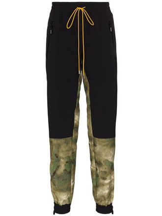 Rhude pantalon de jogging &agrave; motif camouflage - Noir