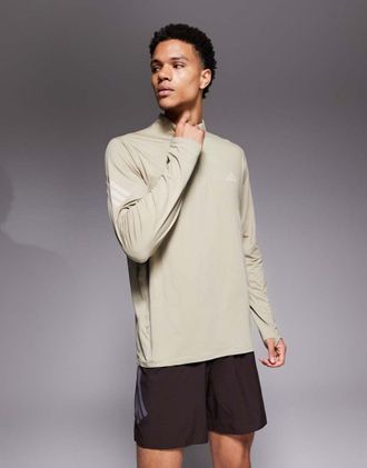 adidas adidas Running - adi365 - Oberteil in Khaki mit kurzem Rei&szlig;verschluss-Schwarz