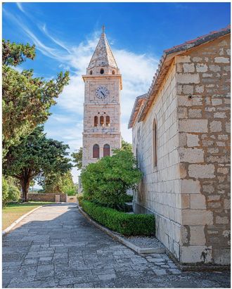 Wallario Poster - Stille am Kirchturm in Premiumqualit&auml;t, Gr&ouml;&szlig;e: 40 x 50 cm