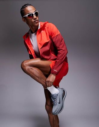 Nike Vomero Plus - Baskets - Gris/orange