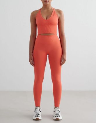 Aim'n Legging moulant sans coutures effet sculptant - Clémentine-Orange