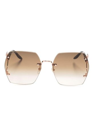 Gucci lunettes de soleil GG &agrave; monture oversize - Marron