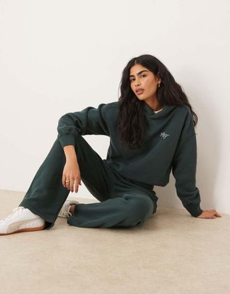 Abercrombie & Fitch Sweat &agrave; capuche densemble avec logo sur le devant - Vert