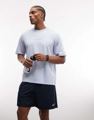 Nike Athletic Club - T-shirt perfor&eacute; &agrave; inscription logo - Bleu