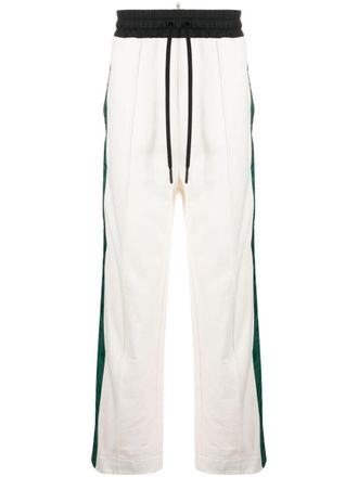 Moncler pantalon de jogging &agrave; rayures lat&eacute;rales - Blanc