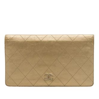Chanel Portefeuille bifold matelass&eacute; doccasion - Femme - Pre-owned - Jaune - Taille: ONE Size