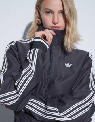 adidas Originals Firebird haut de surv&ecirc;tement en chevrons noir
