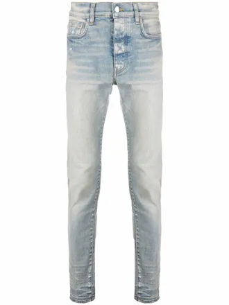 Amiri jean skinny à patch logo - Bleu