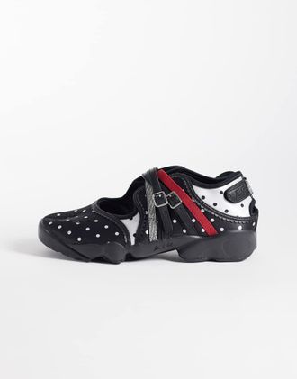 Nike Air Rift baskets &agrave; pois noirs et blancs