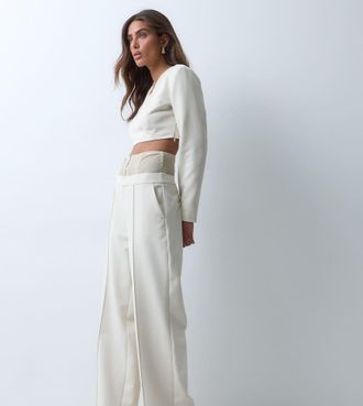 Asos ASOS X THE SOURCED COLLECTION pantalon large avec d&eacute;tail corset &agrave; la taille en cr&egrave;me-Neutre