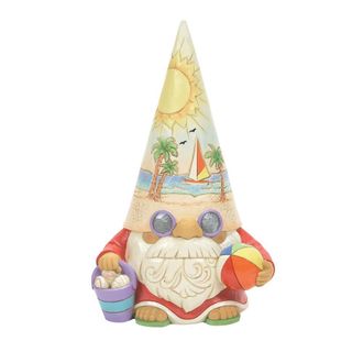 Enesco Jim Shore Heartwood Creek Four Seasons Time for a Shell-ebration Coastal Gnom Figur mit Sonnenuntergang und Beachball, 18 cm, handbemalt, Steinharz, S