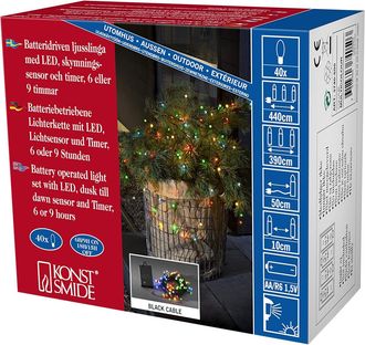 Konstsmide LED Globelichterkette, runde Dioden, mit an/aus Schalter Lichtsensor und 6h und 9h Timer, 40 bunte Dioden, batteriebetrieben, Außen (IP44), schwarzes 