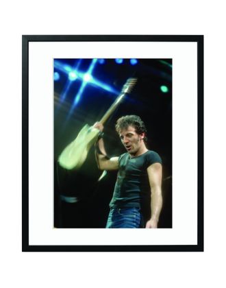 Sonic Editions Bruce Springsteen swings guitar