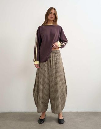 Topshop Kombiteil-Hose mit Hufeisen-Schnitt und Karomuster-Multi