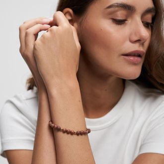 Tamaris Bracelet - Elegantes Armband aus poliertem Edelstahl - IP Gold - Gummiband verstellbar bis 18 cm - wasserfest & hautfreundlich